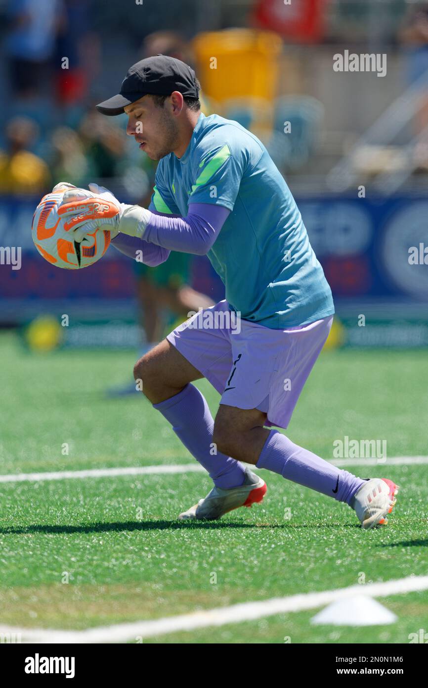 Substitute goal keeper, Christian Tsangas of Australia warms up before ...