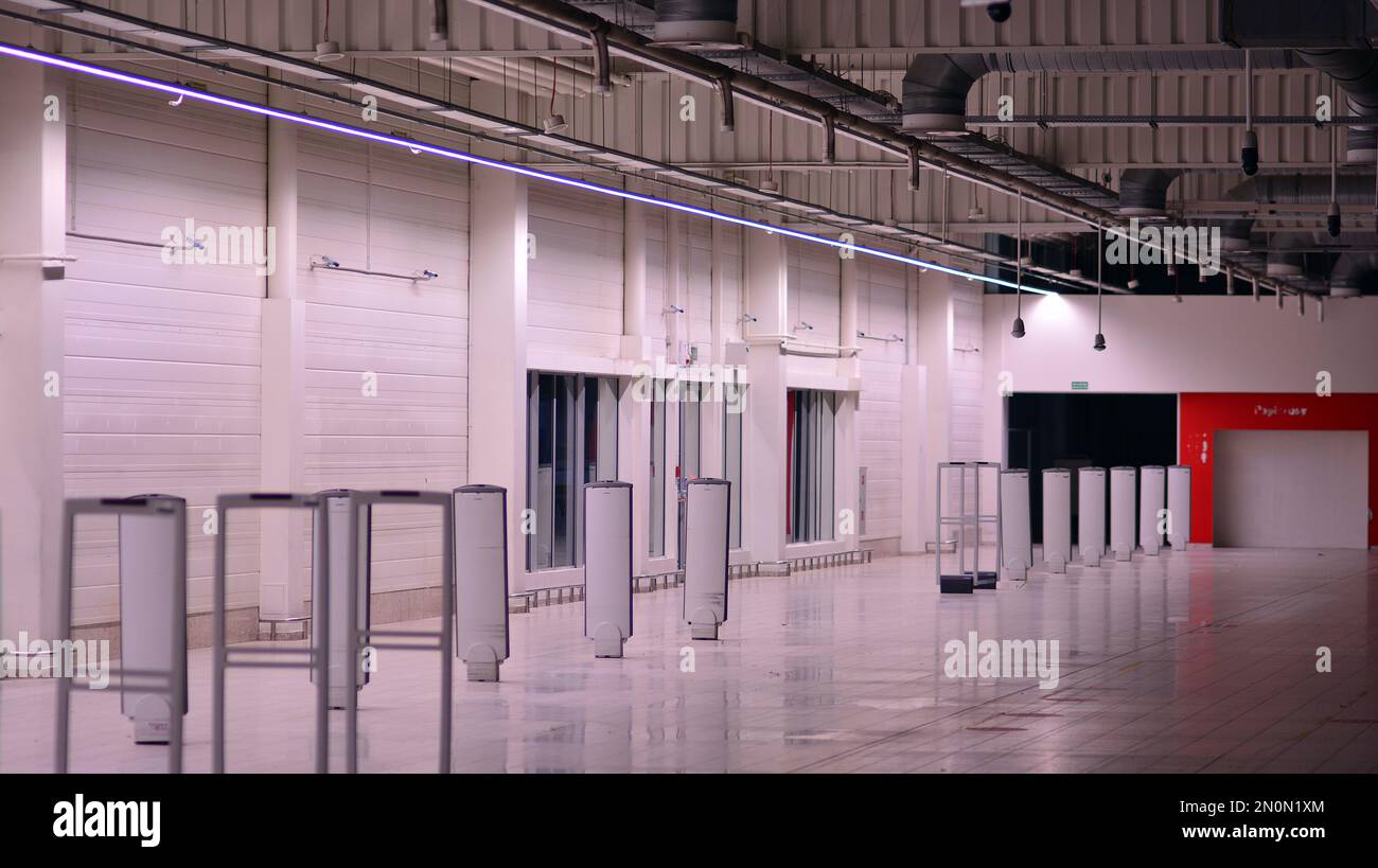 Supermarket going out of business. Interior of a closed big supermarket ...