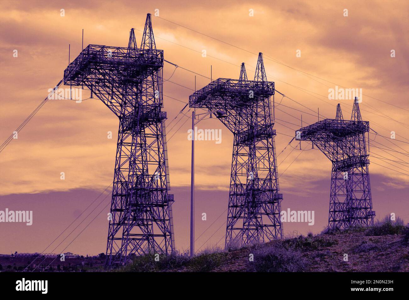 arizona sunset over electric power towers Stock Photo - Alamy