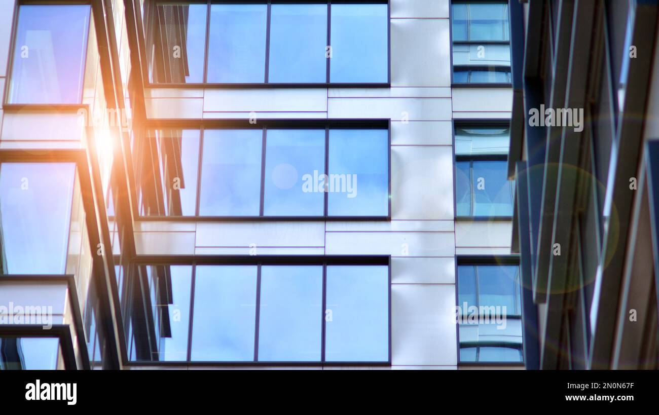 Facade texture of a glass mirrored office building. Fragment of the ...