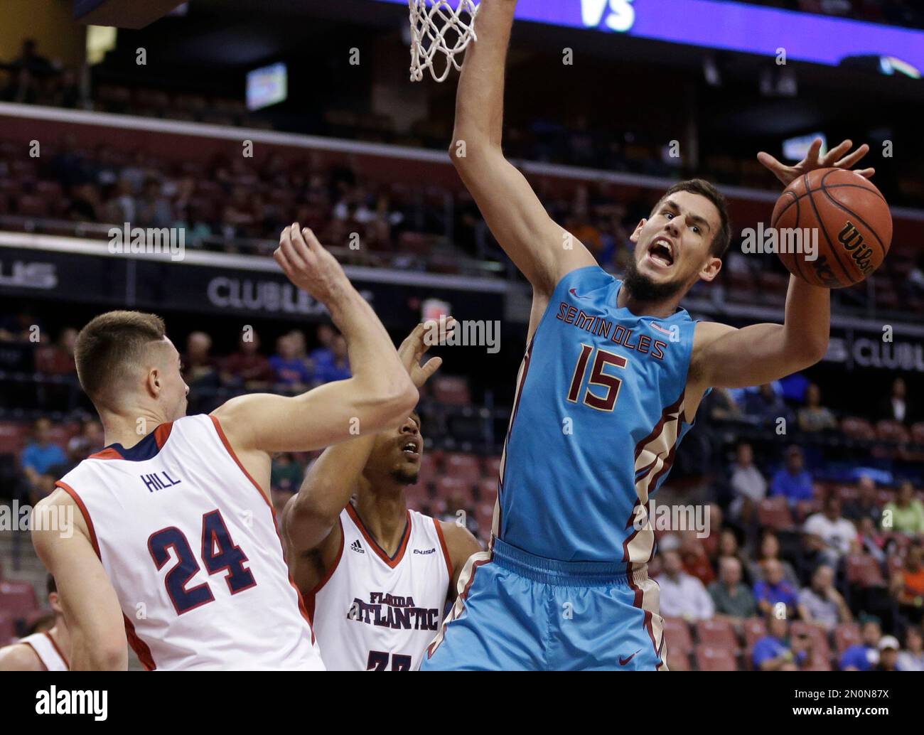 Florida State 's Boris Bojanovsky (15) is fouled by Florida Atlantic's ...