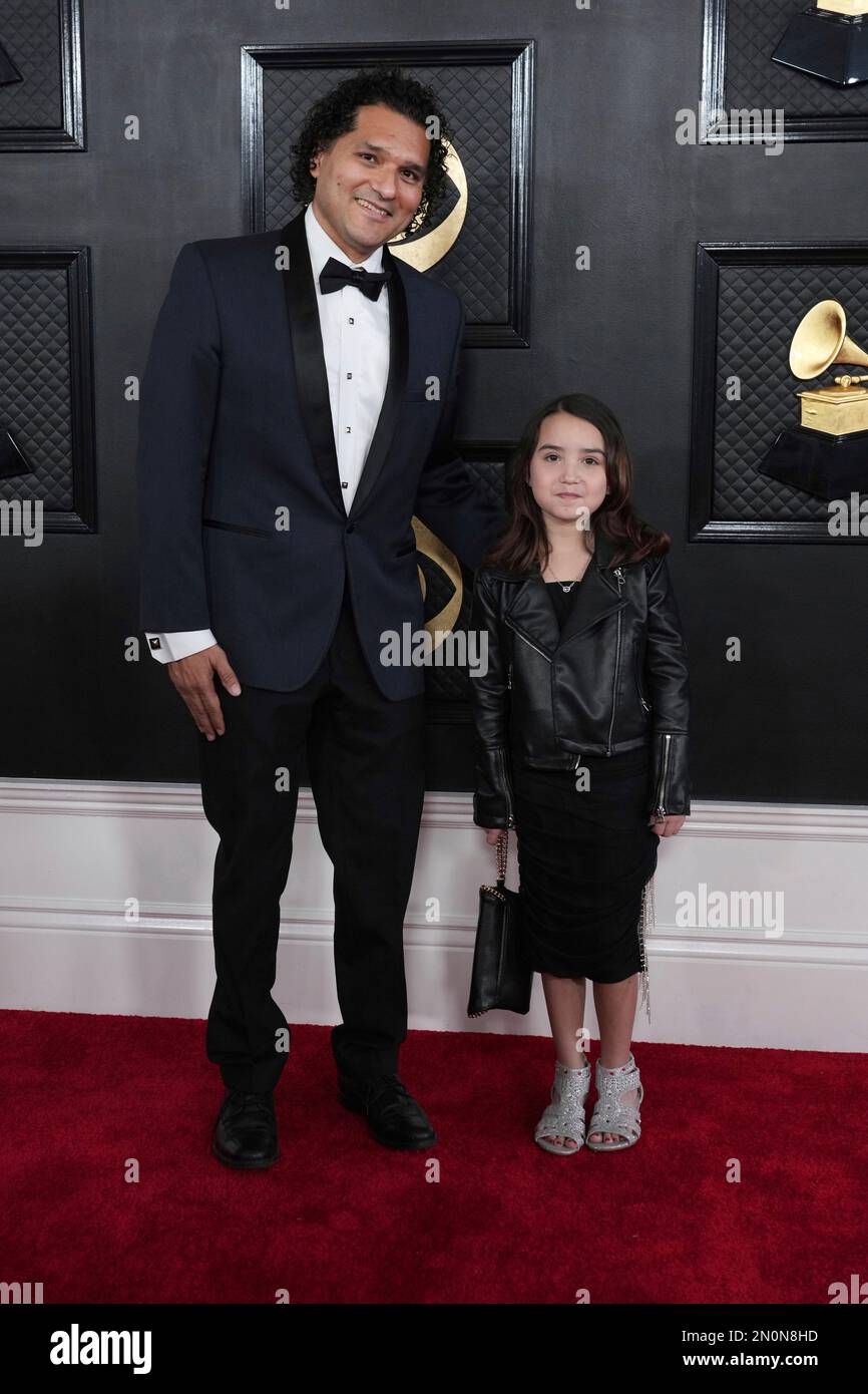 Eric Morones, left, and Ava Morones arrive at the 65th annual Grammy ...
