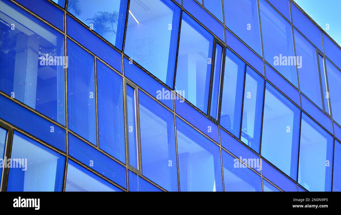 Facade texture of a glass mirrored office building. Fragment of the ...