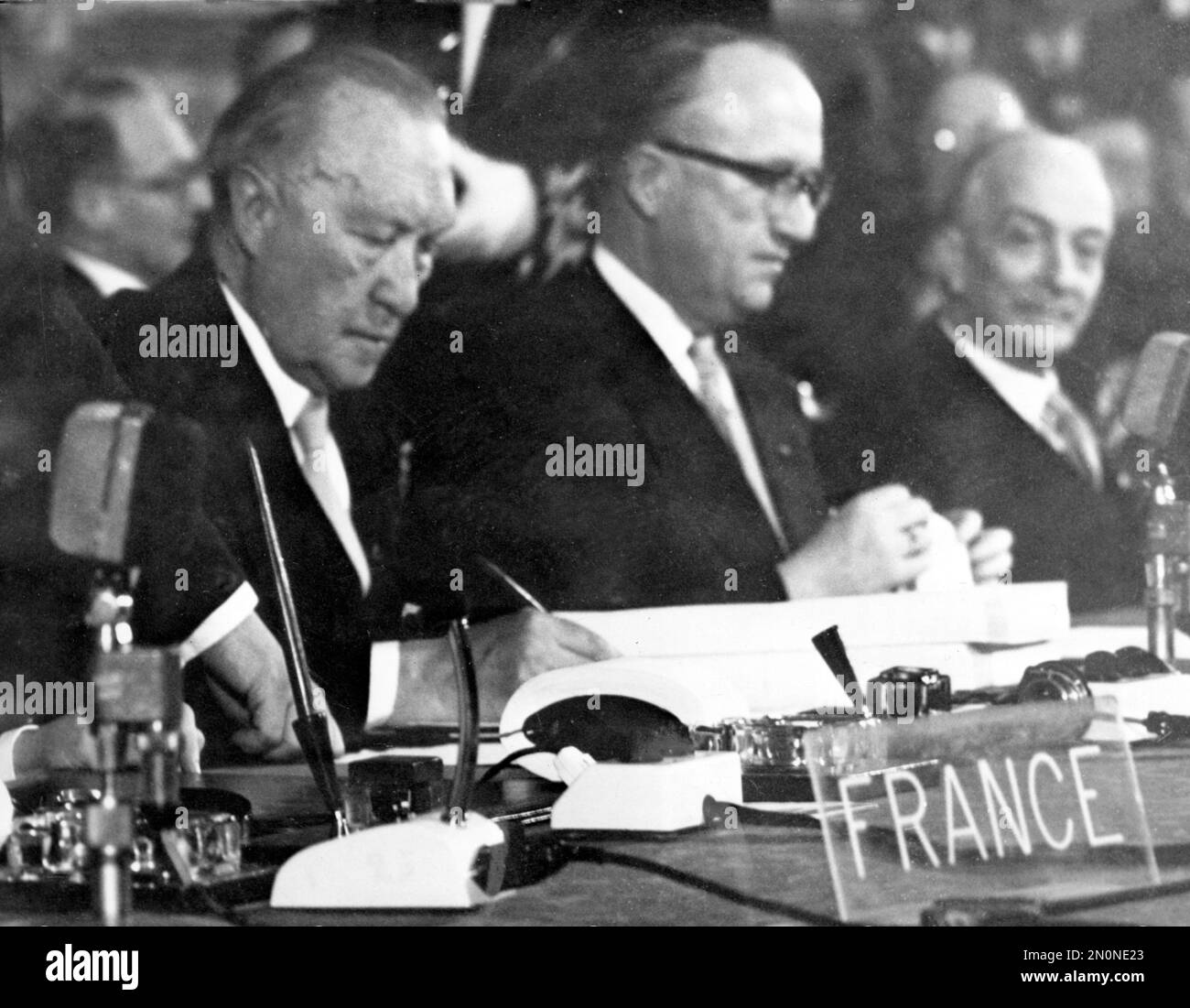 German Chancellor Konrad Adenauer, left, signs the Euratom and Common ...