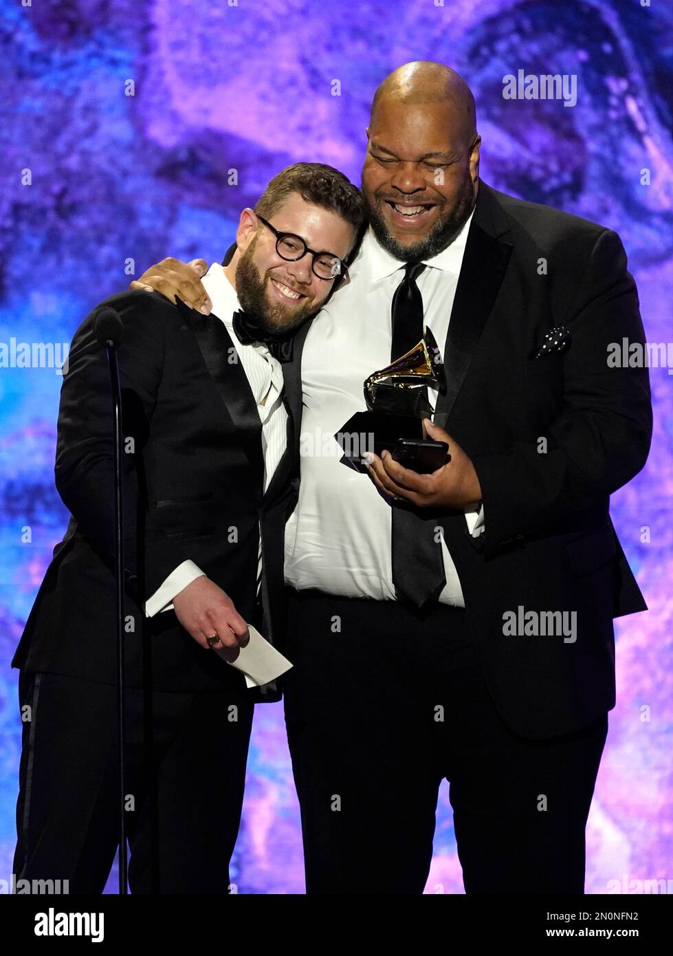 Steven Feifke, left, and Bijon Watson accept the award for best large ...