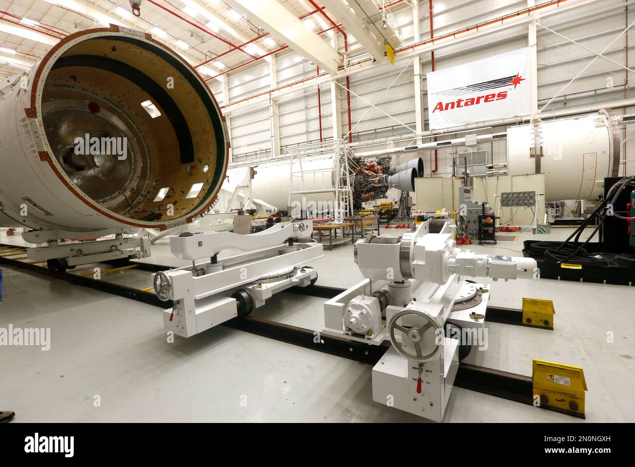 Two Antares rockets are in different stages of completion during a tour ...