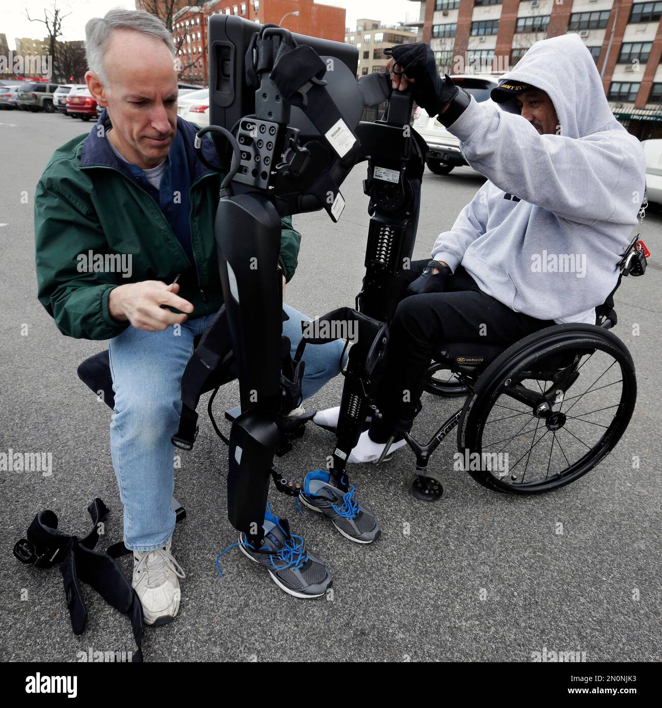 ReWalk Robotics service engineer Tom Coulter prepares a ReWalk device ...