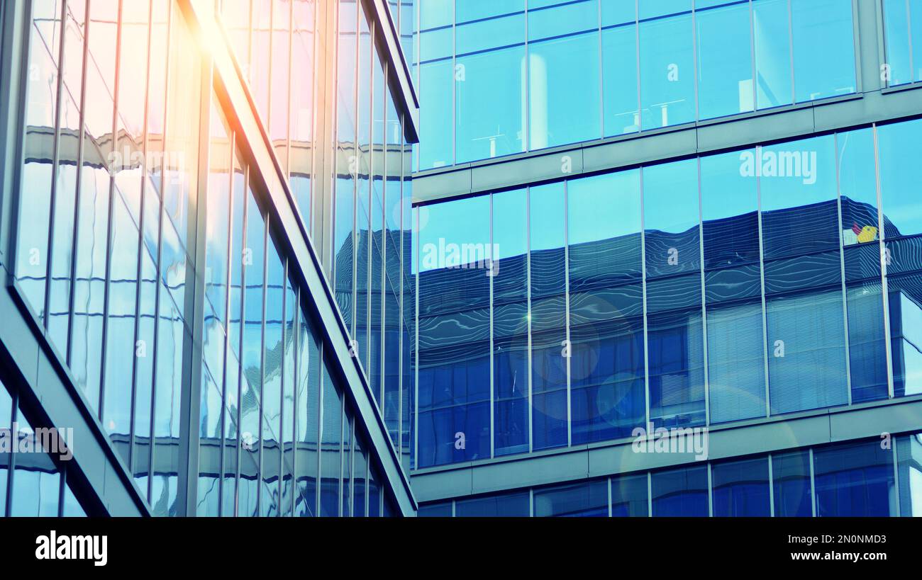 Modern office building facade abstract fragment, shiny windows in steel ...