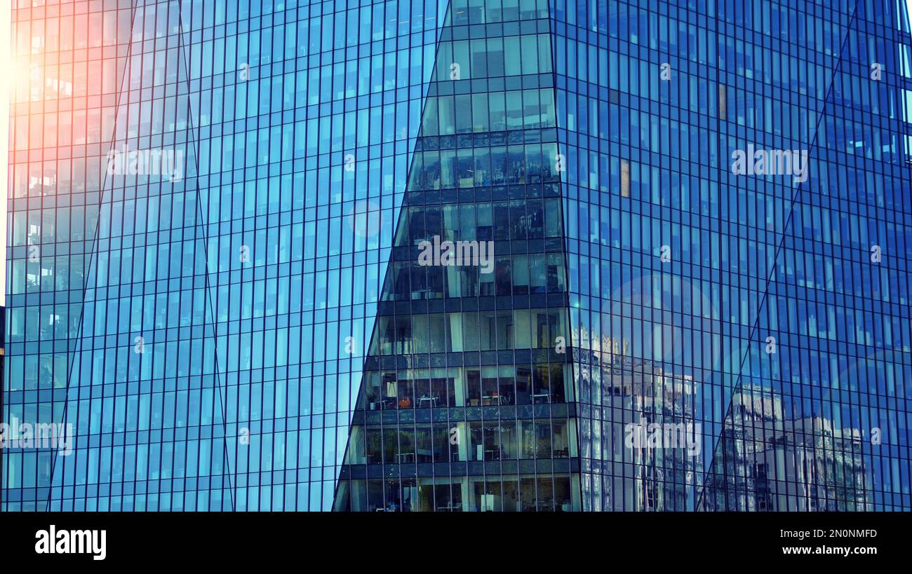 Modern office building facade abstract fragment, shiny windows in steel ...