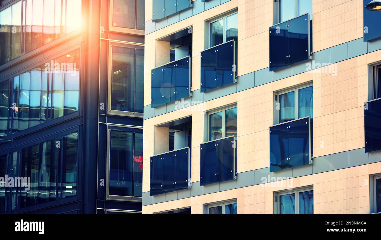 Modern office building facade abstract fragment, shiny windows in steel ...