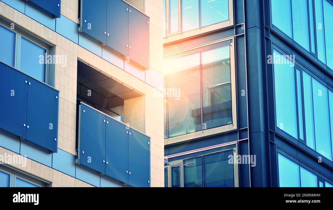 Modern office building facade abstract fragment, shiny windows in steel ...