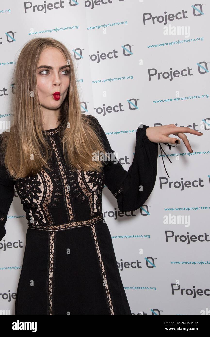 Cara Delevingne poses for photographers upon arrival at the Project 0 ...