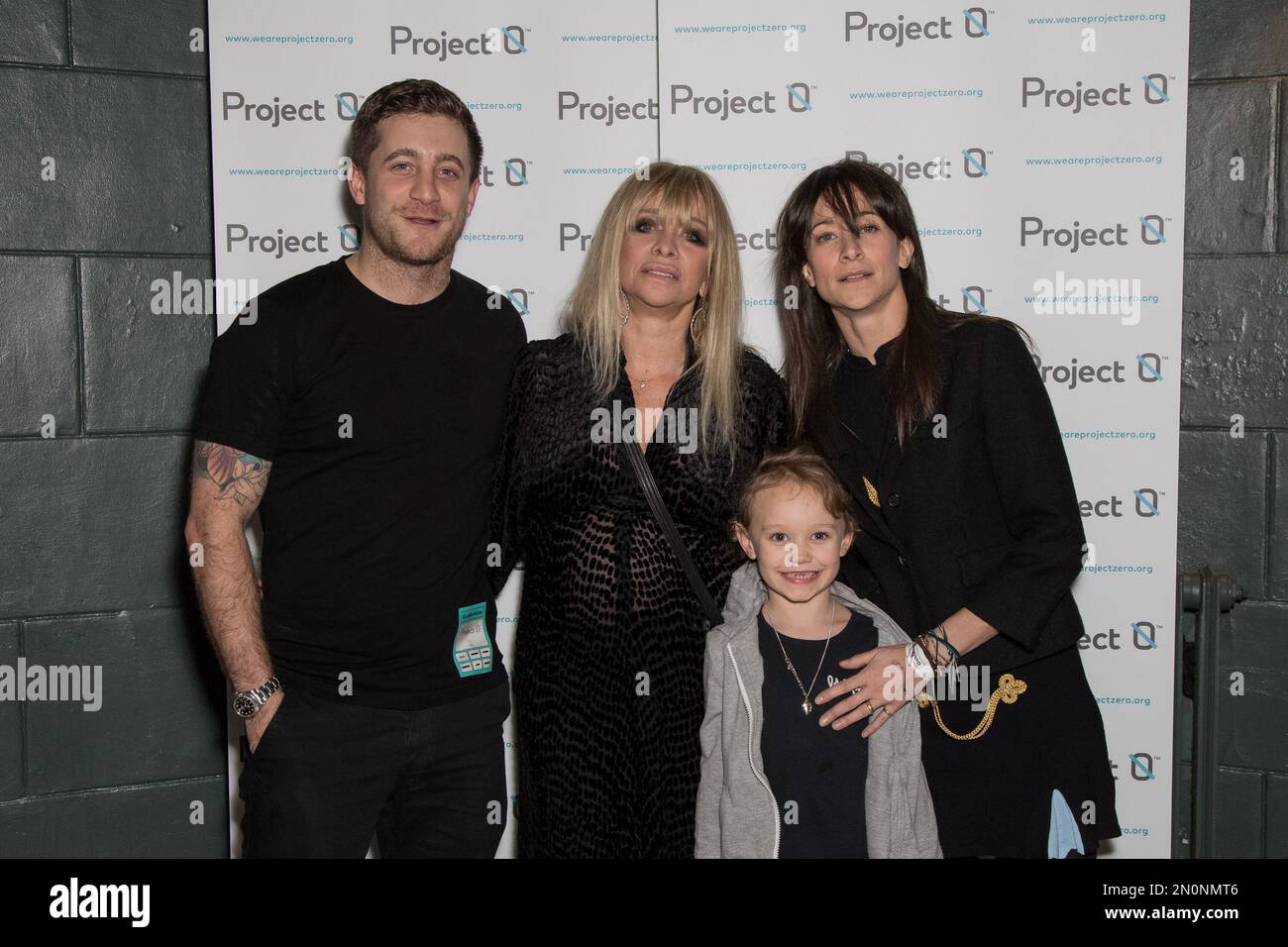 From left, Tyrone Wood, Jo Wood and Leah Wood pose for photographers ...