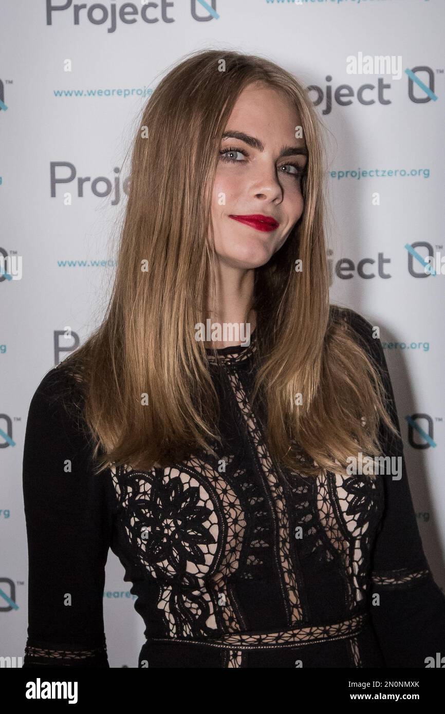 Cara Delevingne poses for photographers upon arrival at the Project 0 ...