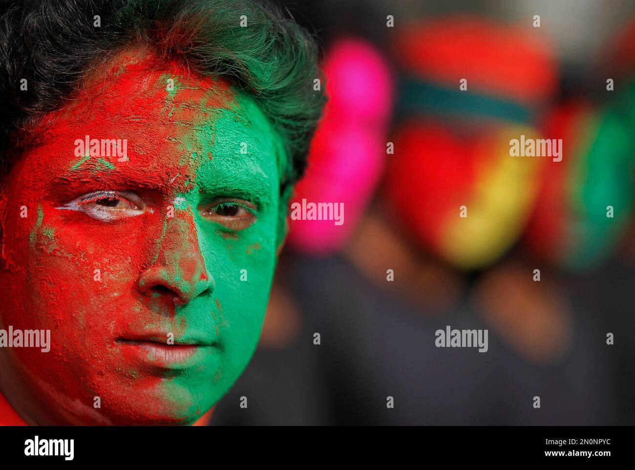 A Bangladeshi man painted his face with the color of Bangladesh’s ...