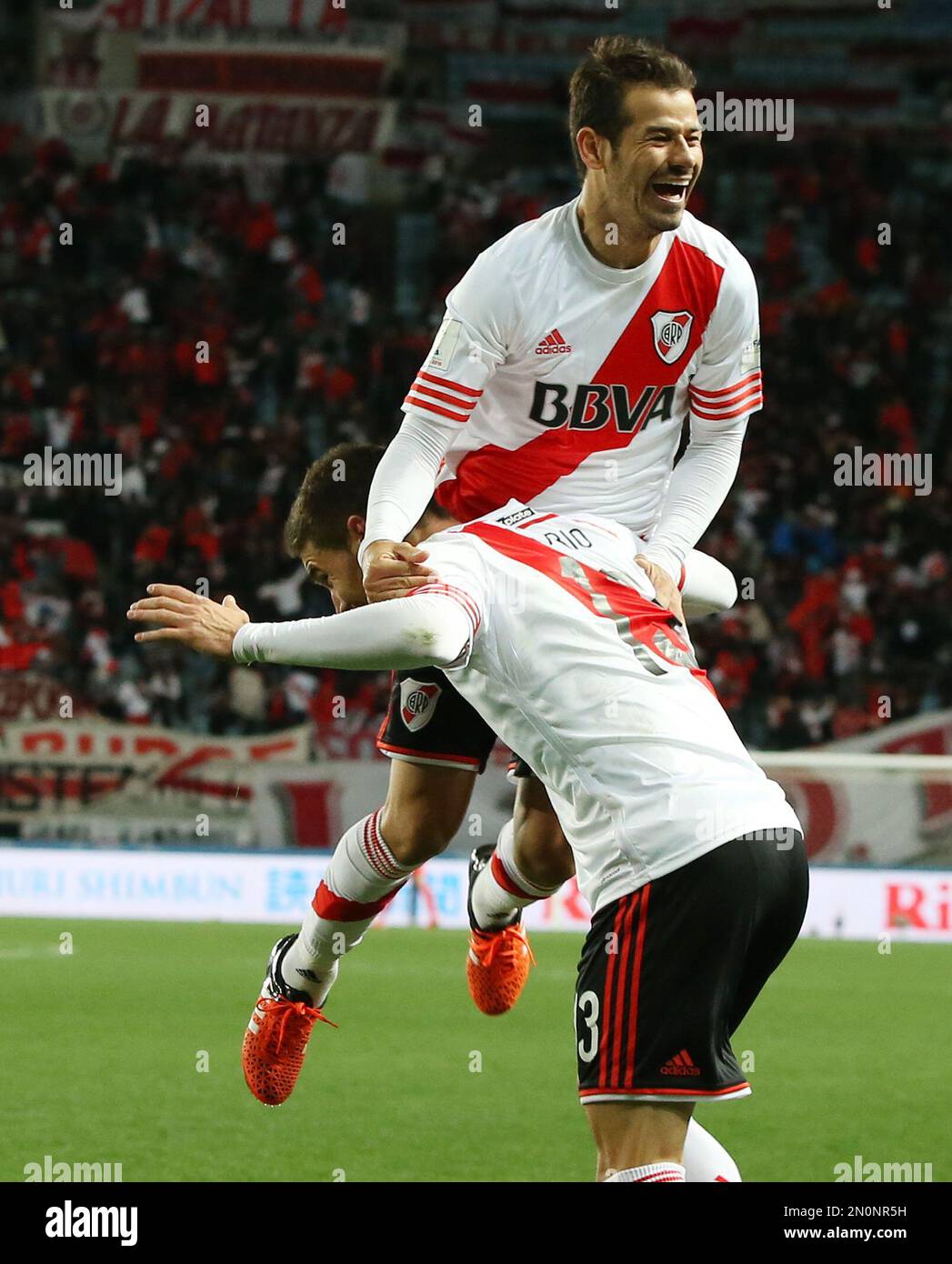 River Plate’s Rodrigo Mora of Uruguay leaps on top of teammate Lucas ...