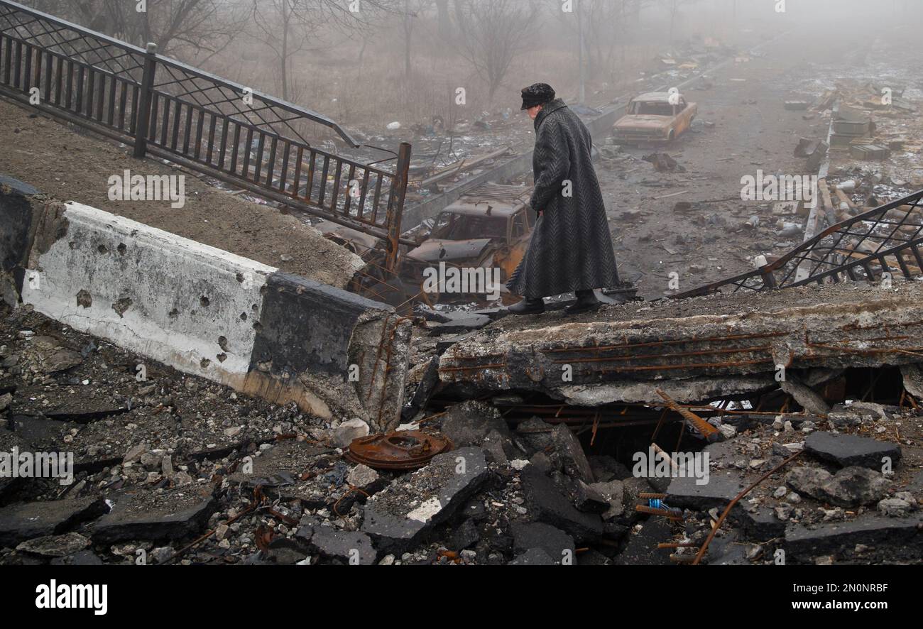 FILE - In this Sunday, March 1, 2015, file photo an elderly woman walks ...