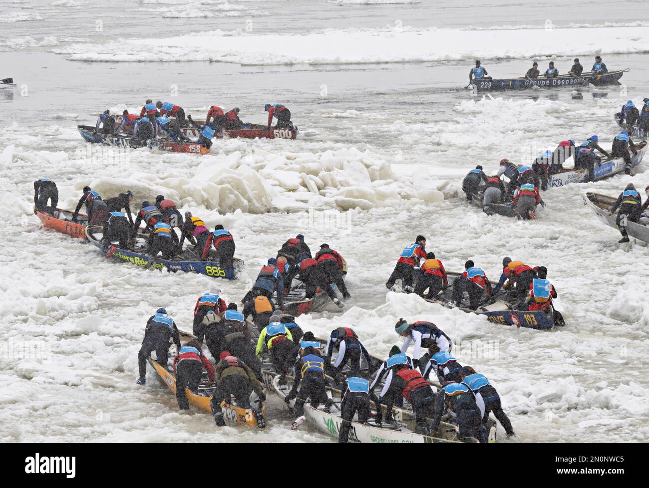 Some of the 50 teams take the start of the Quebec Winter Carnival ice ...