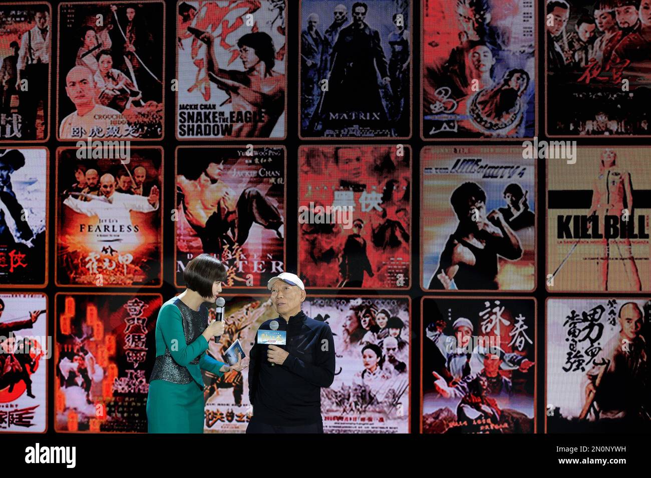 Hong Kong action director Yuen Wo-ping, right, speaks with emcee on ...