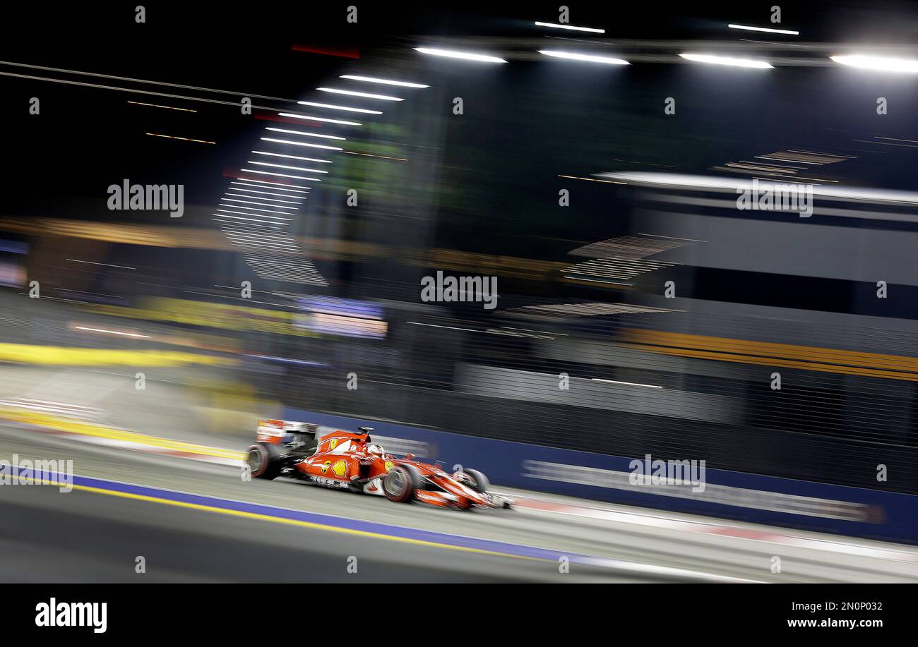 In this Sept. 20, 2015, file photo, Ferrari driver Sebastian Vettel of ...