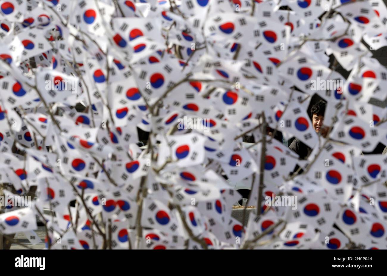 In this Feb. 26, 2015, file photo, a man looks at South Korean national ...