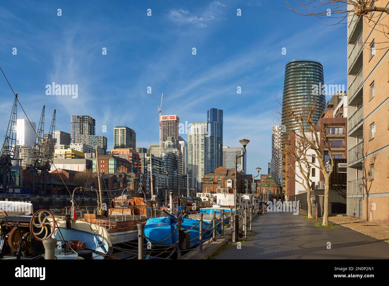 Walkway along Millwall Inner Dock, London Docklands, UK, looking north ...