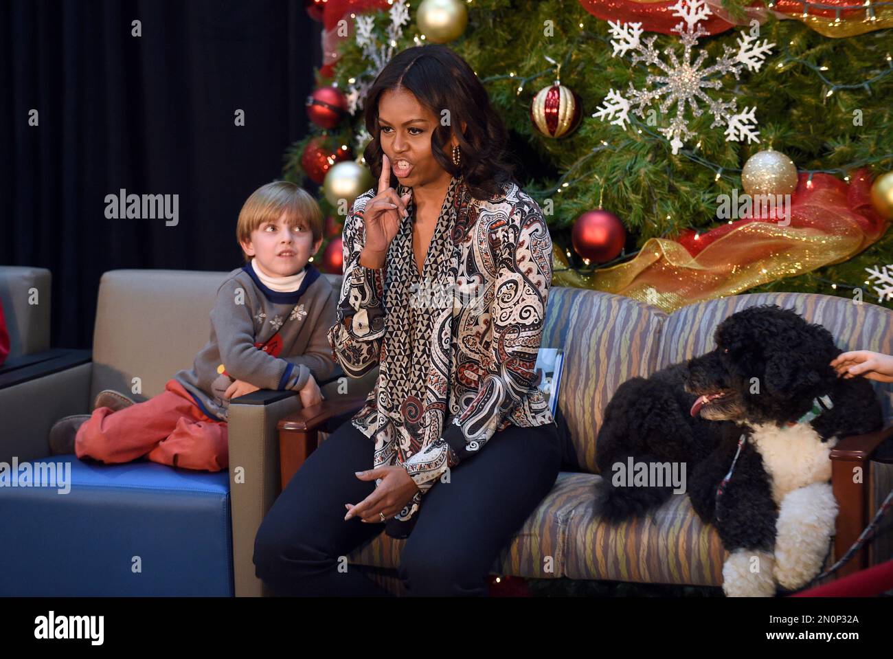First lady Michelle Obama quiets the audience as she answers the ...