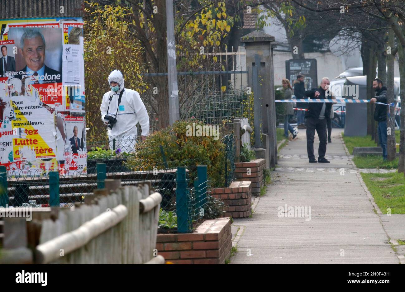 An investigative police officer, left, arrives at a pre-school after a ...