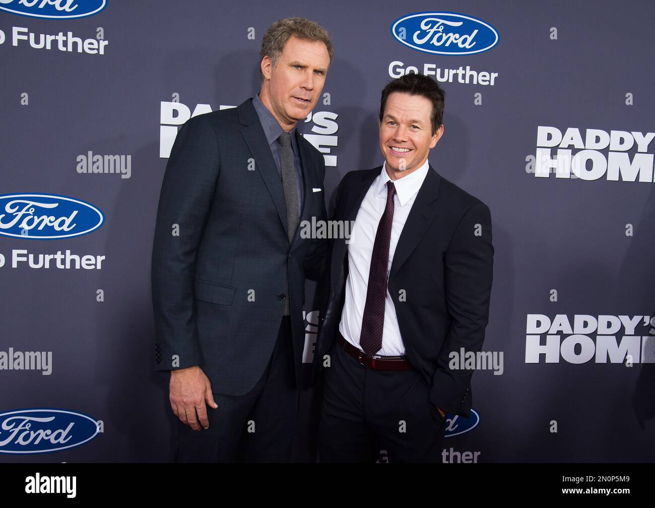 Will Ferrell, left, and Mark Wahlberg attend the premiere of "Daddy's ...