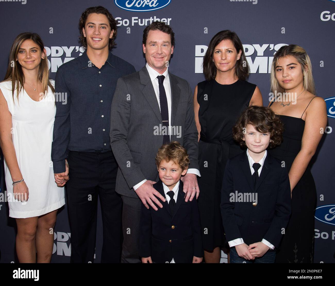 Brian Burns, center, and family attend the premiere of "Daddy's Home ...