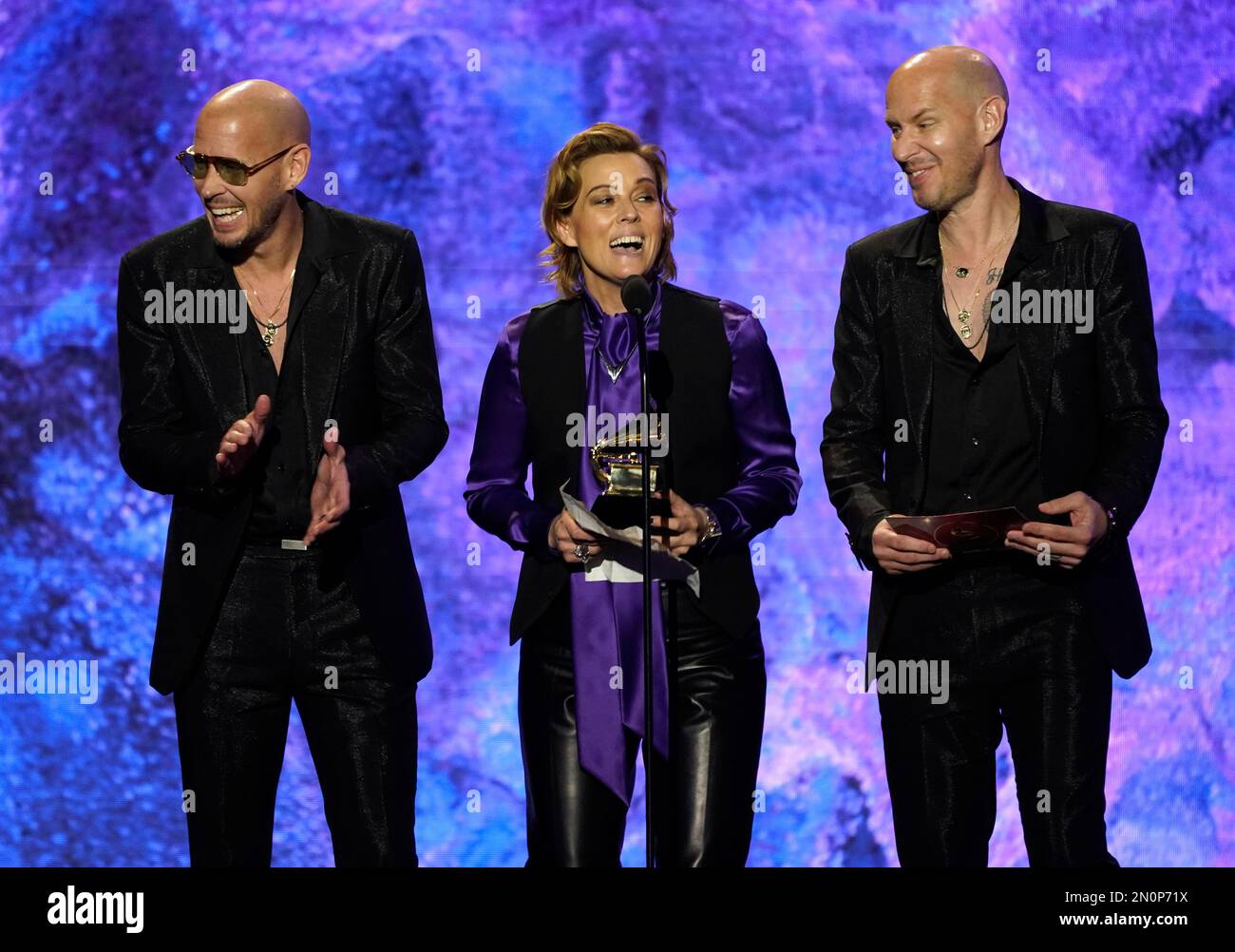 Phil Hanseroth, from left, Brandi Carlile and Tim Hanseroth accept the ...