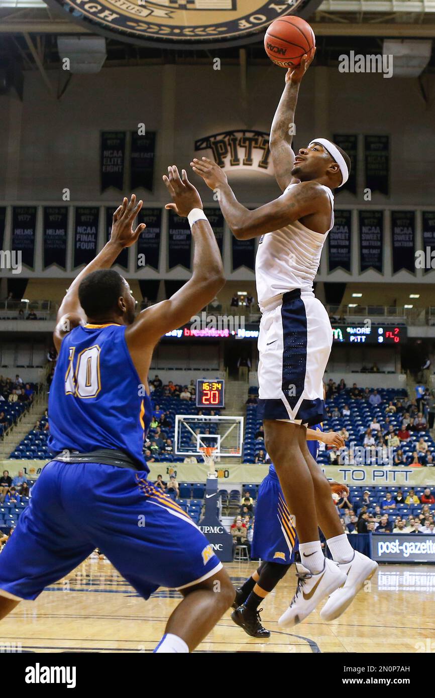 Pittsburgh's Michael Young, right, shoots over Morehead State's Anthony ...