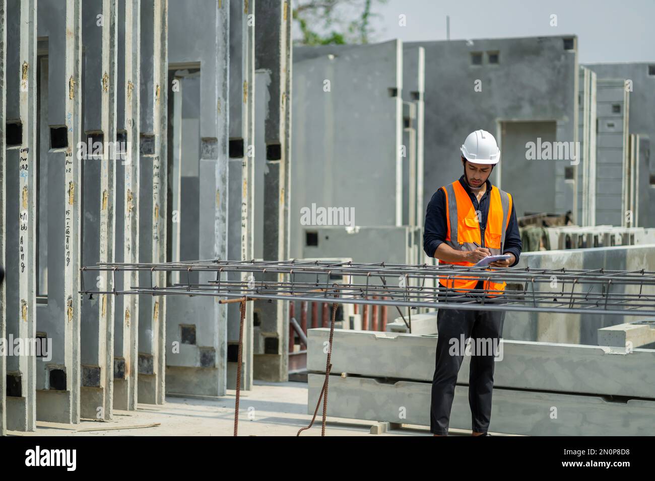 Male engineers are inspecting and controlling the work of the employees ...