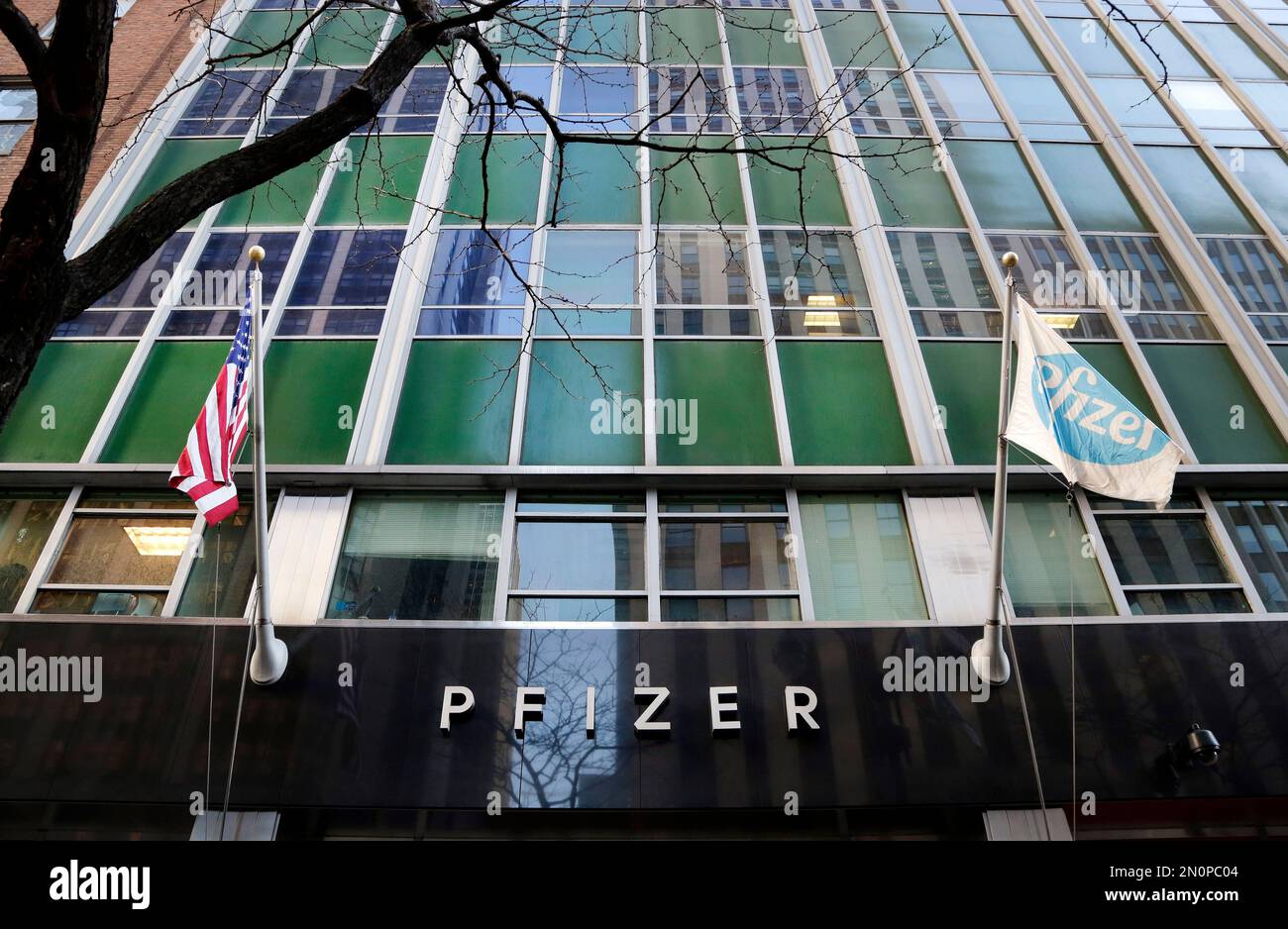 Flags fly in front of Pfizer World Headquarters, Monday, Nov. 23, 2015 ...