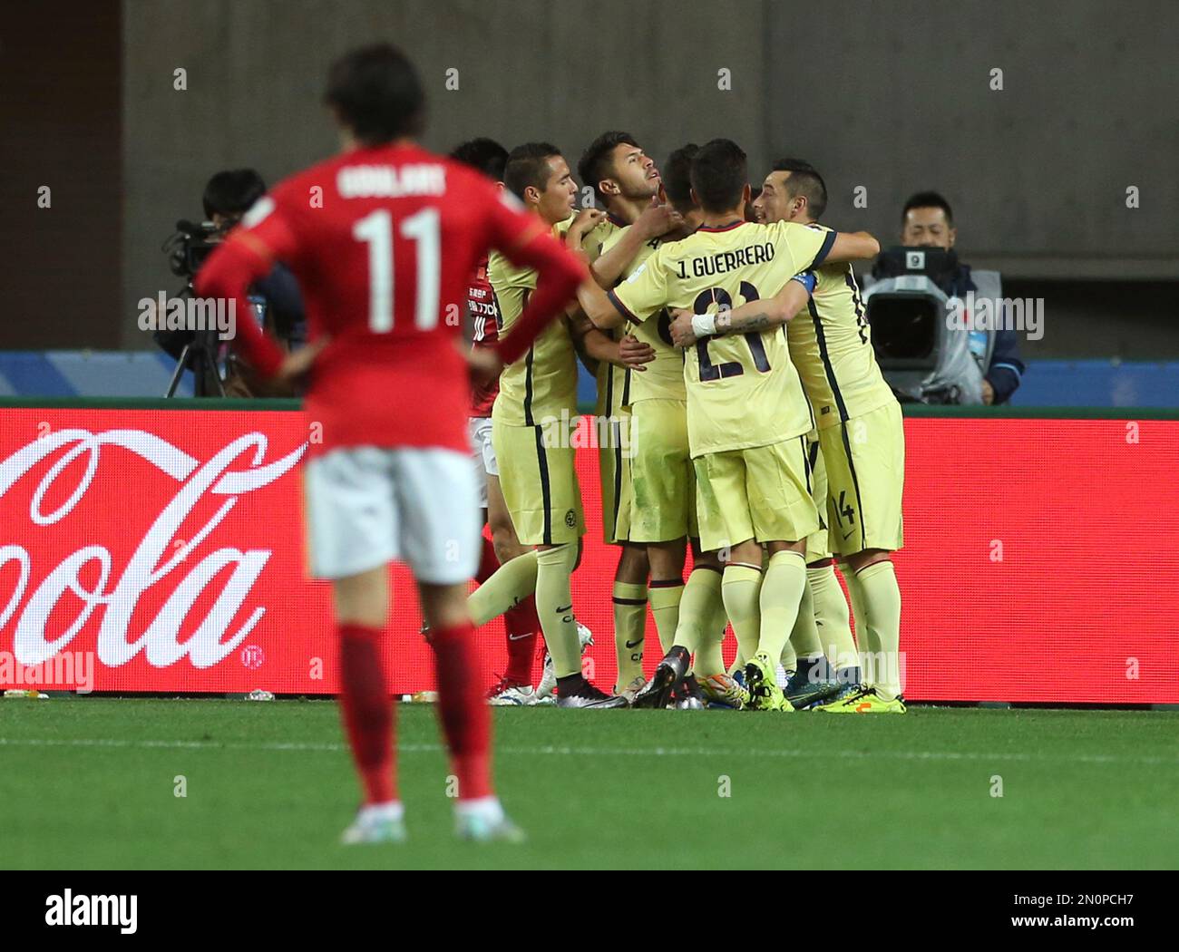 Club America team members cheer Oribe Peralta after scoring on Gangzhou ...