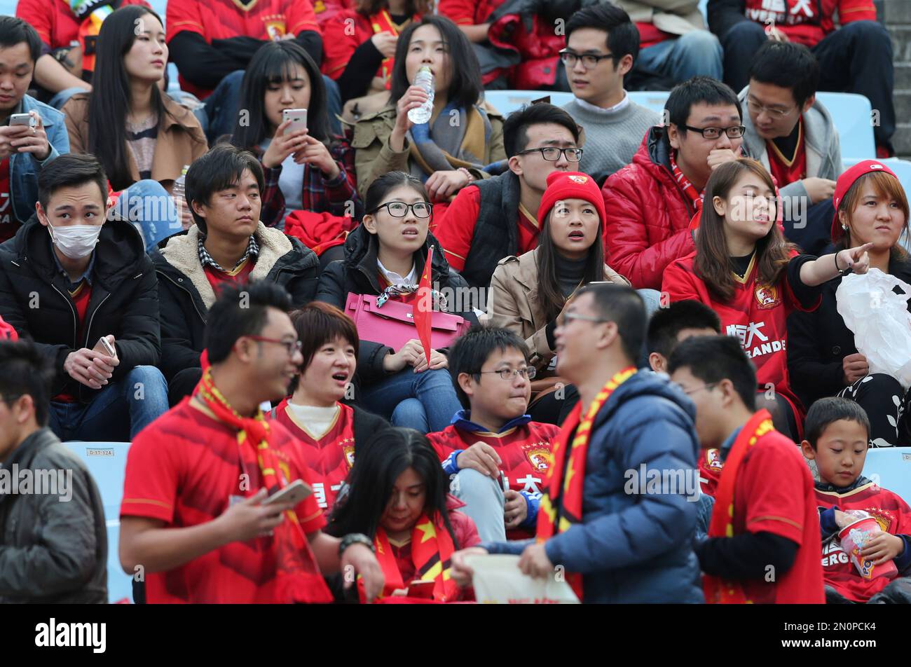 Fans prepare to watch China's Guangzhou Evergrande FC play against Club ...