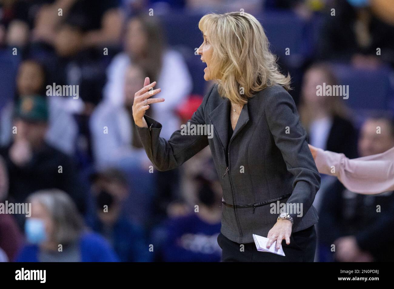 Washington head coach Tina Langley yells to her team during the first ...