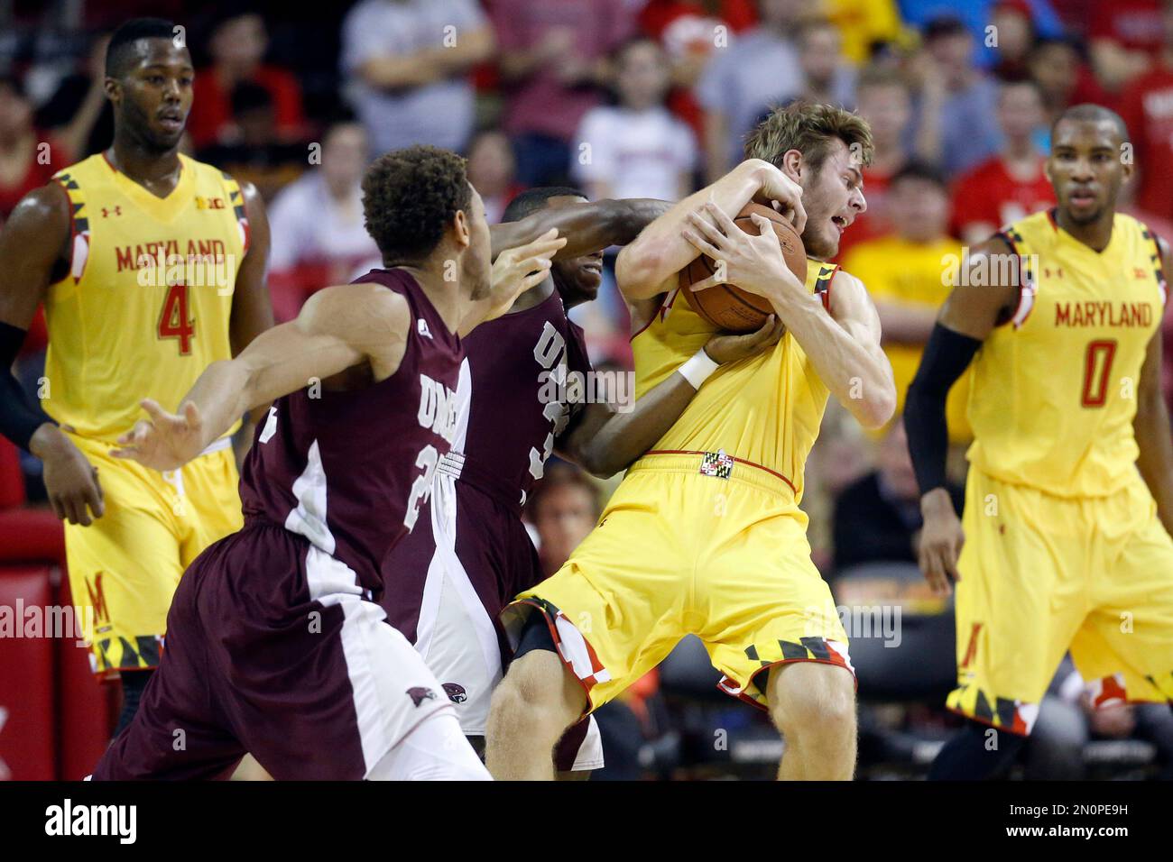 Maryland forward Jake Layman,second from right, pulls the ball away ...
