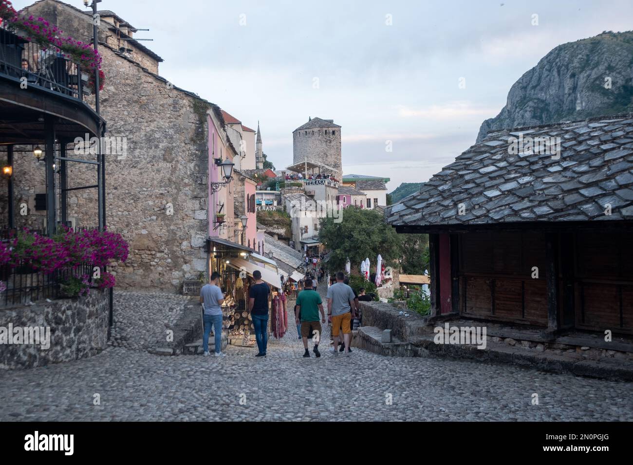 Tourists walking the cobbles at Mostar Stock Photo - Alamy