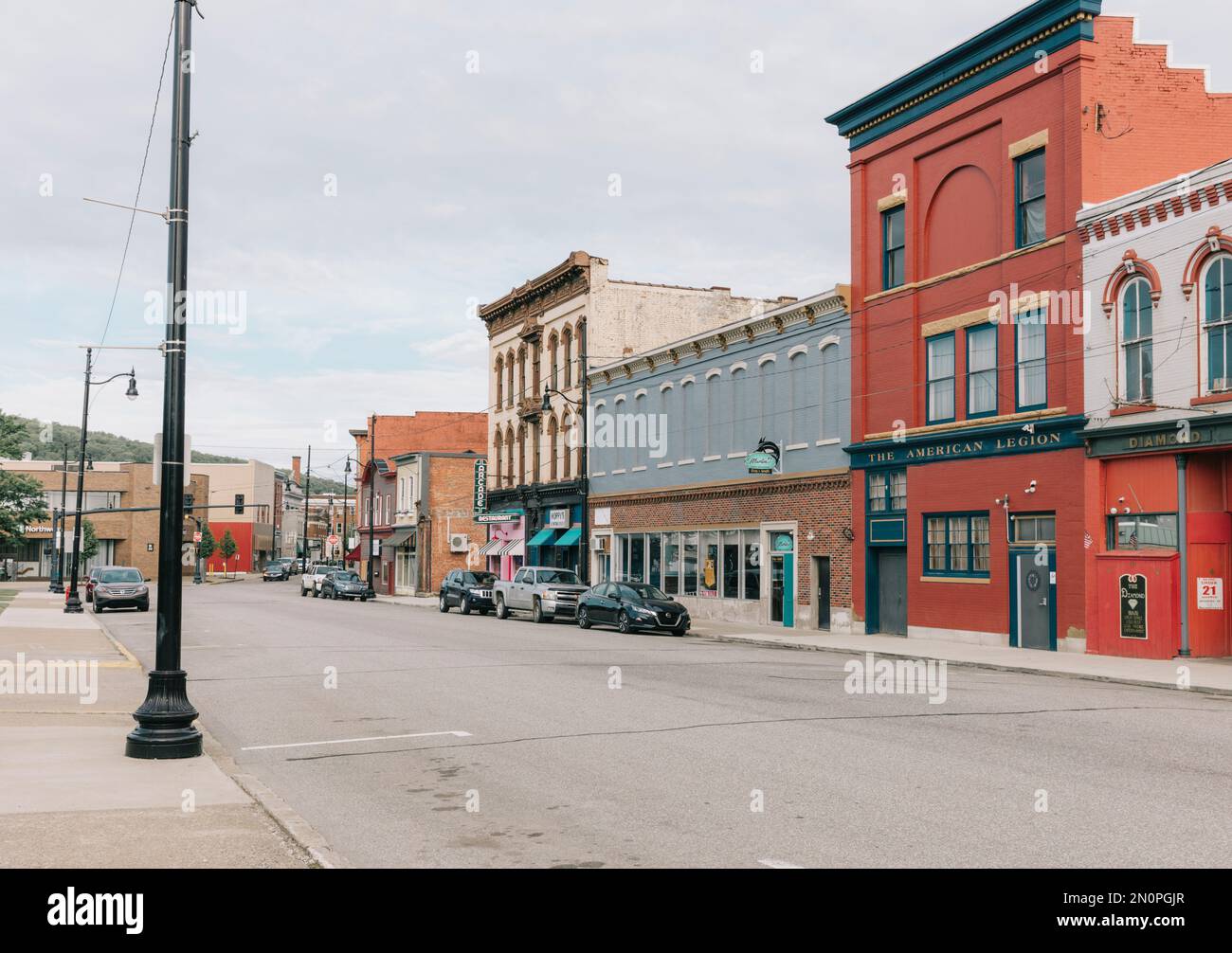 Empty storefronts and buildings along a quiet main street Stock Photo ...