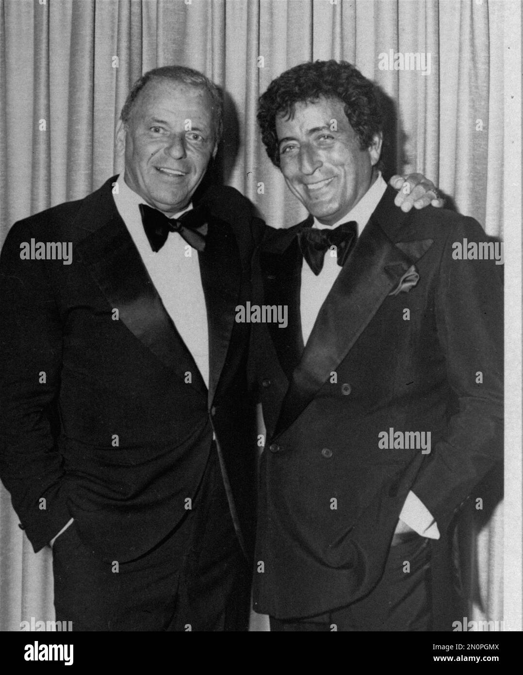 FILE - In this July 1980 file photo, Frank Sinatra, left, poses with ...