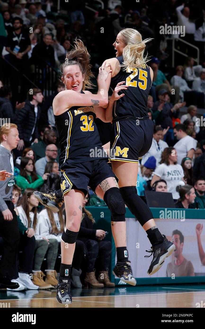 Michigan's Leigha Brown, left, and Whitney Sollom (25) celebrate ...
