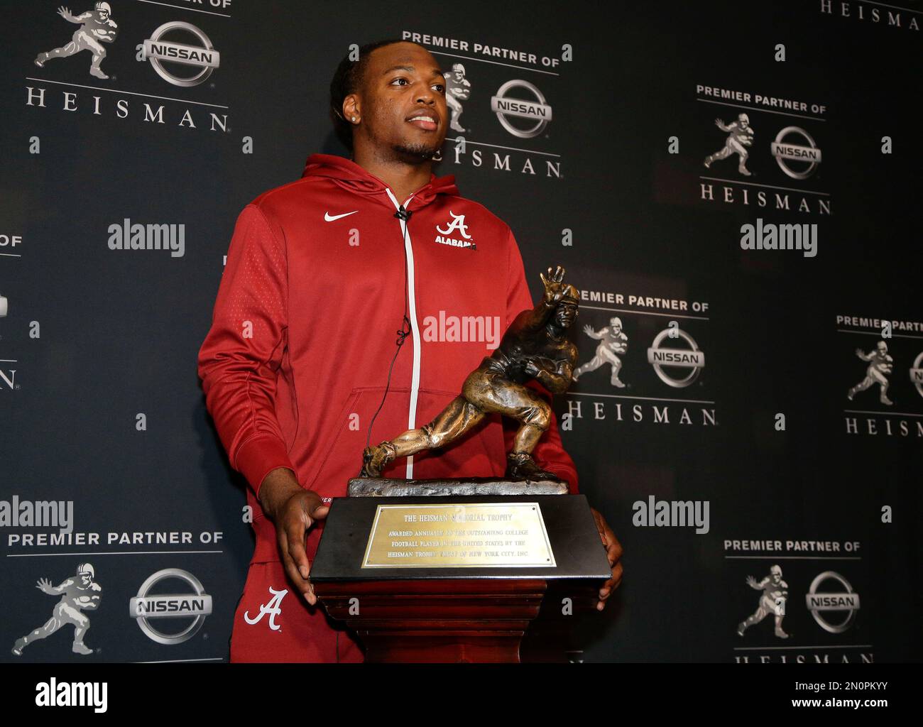 Alabama's Derrick Henry poses for photos with the Heisman Trophy ...