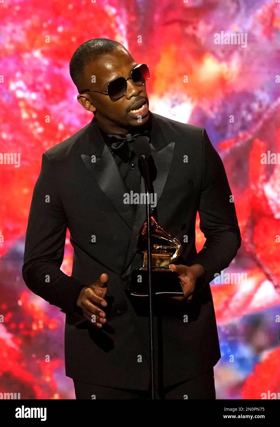 Zakes Bantwini accepts the award for best global music performance for ...