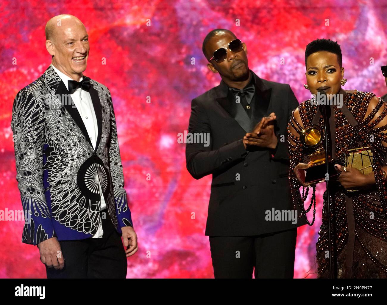 Wouter Kellerman, from left, Zakes Bantwini, and Nomcebo Zikode accept the award for best global ...