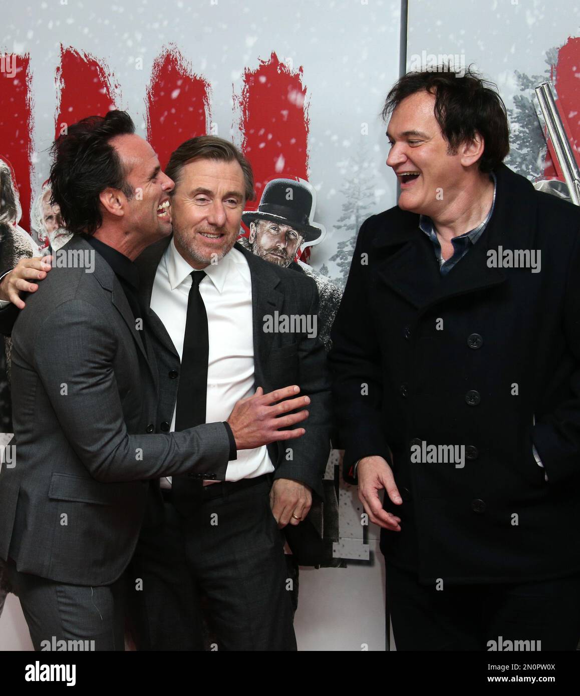 From left, Walton Goggins, Tim Roth and Quentin Tarantino pose for ...