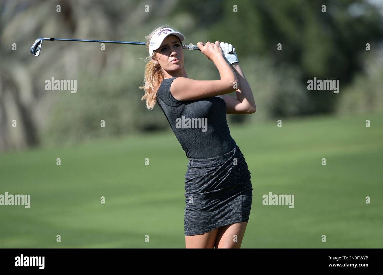 Paige Spiranac of the United States strikes the ball at the third ...
