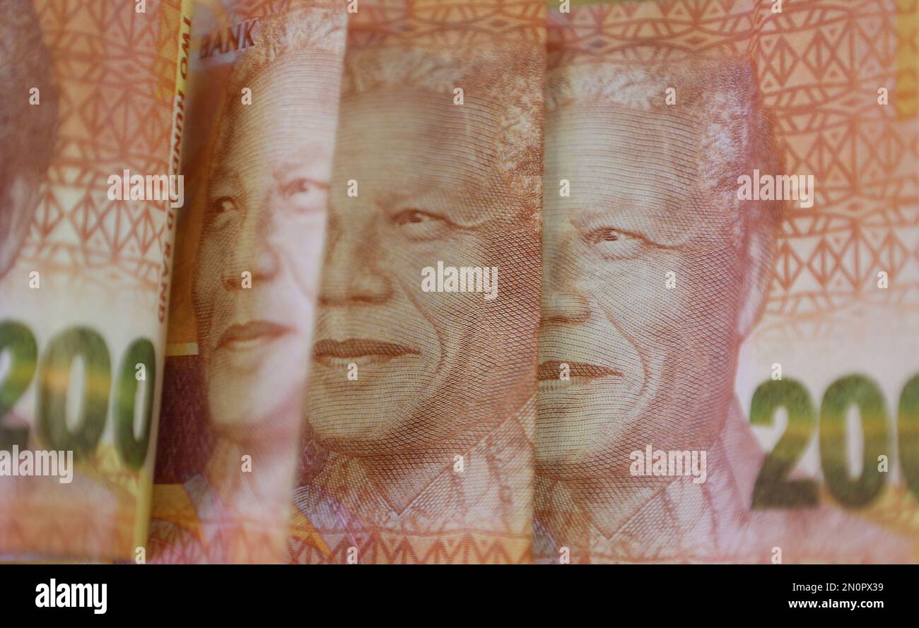 A portrait of the late Nelson Mandela is photographed on two hundred ...