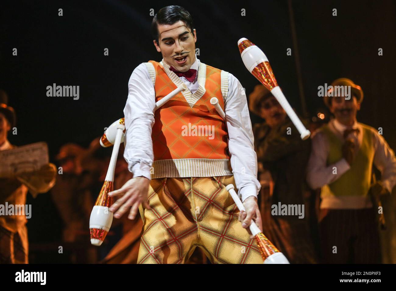 Cast members from Cirque du Soleil perform on stage during the LA ...