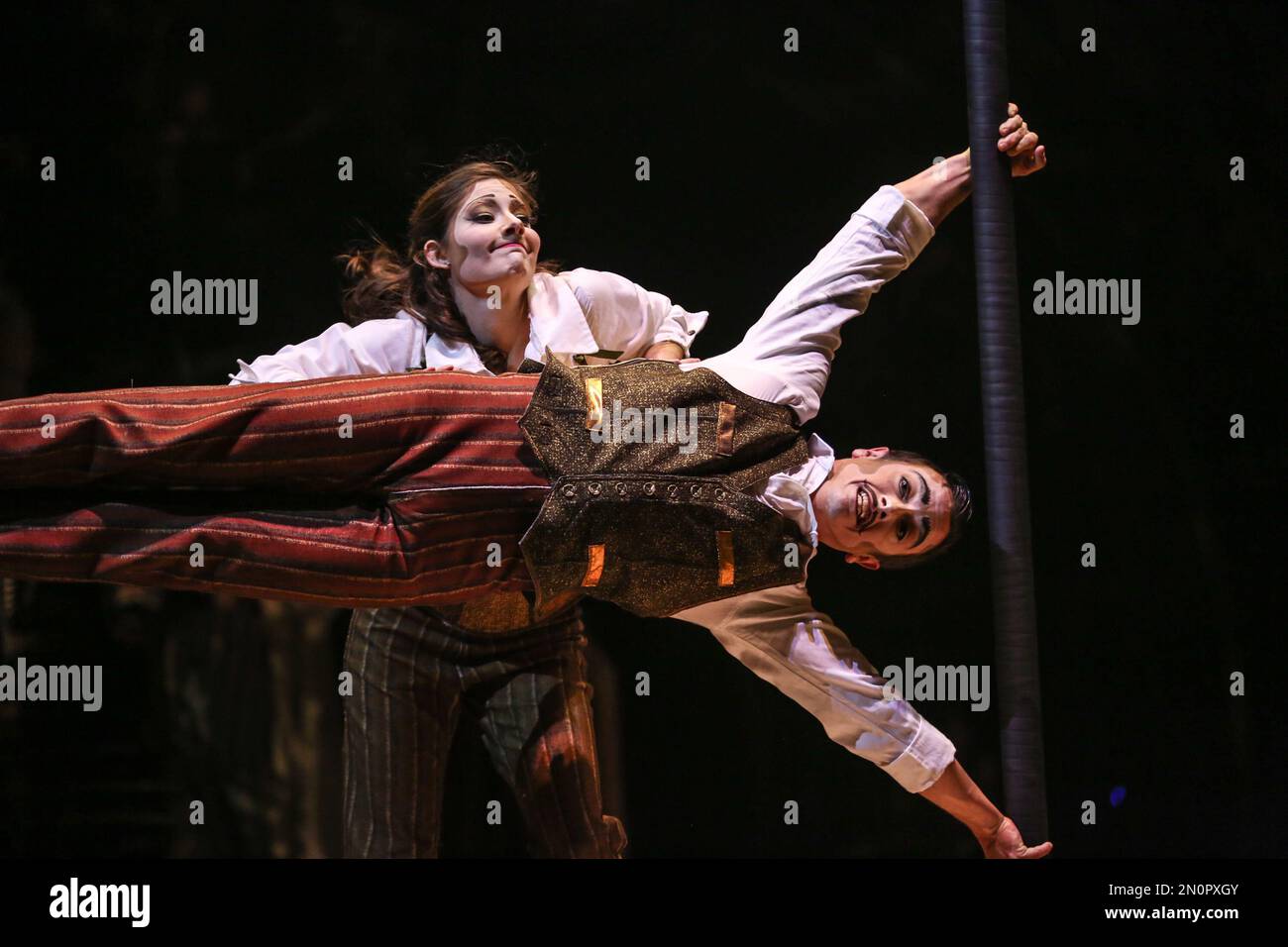 Cast members from Cirque du Soleil perform on stage during the LA ...